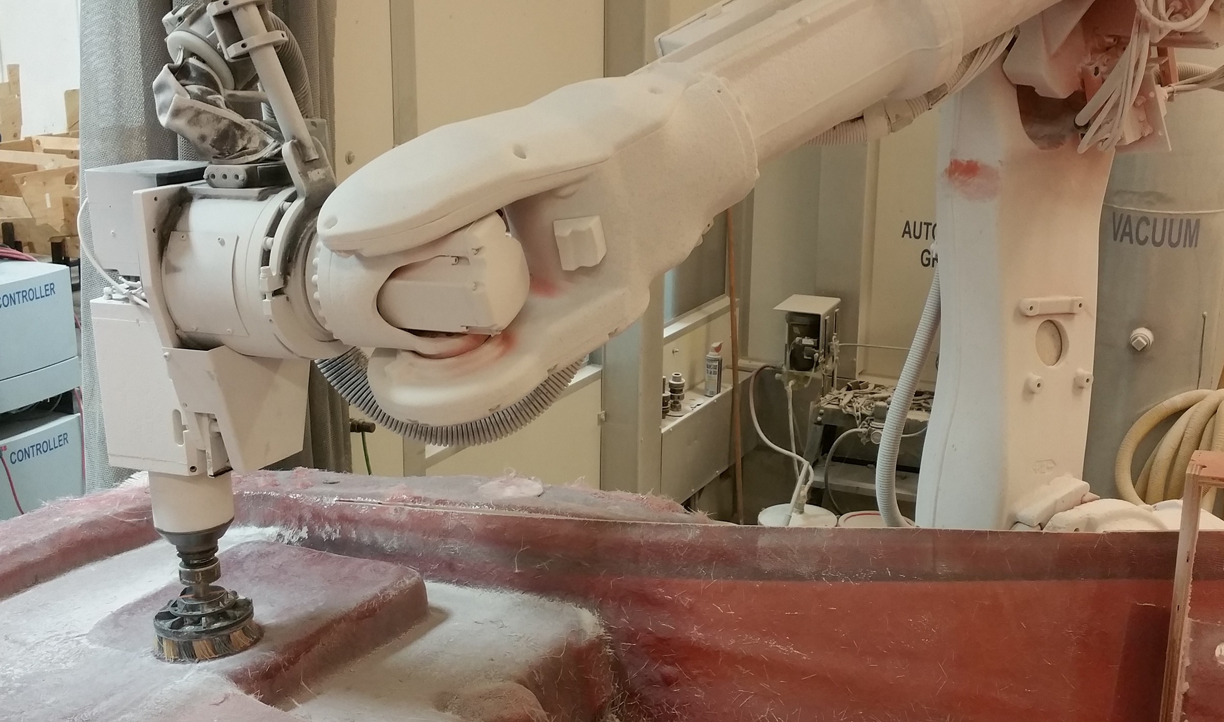 Robotic Hull Cutting, Sanding Speeds Luxury Boat Production ...