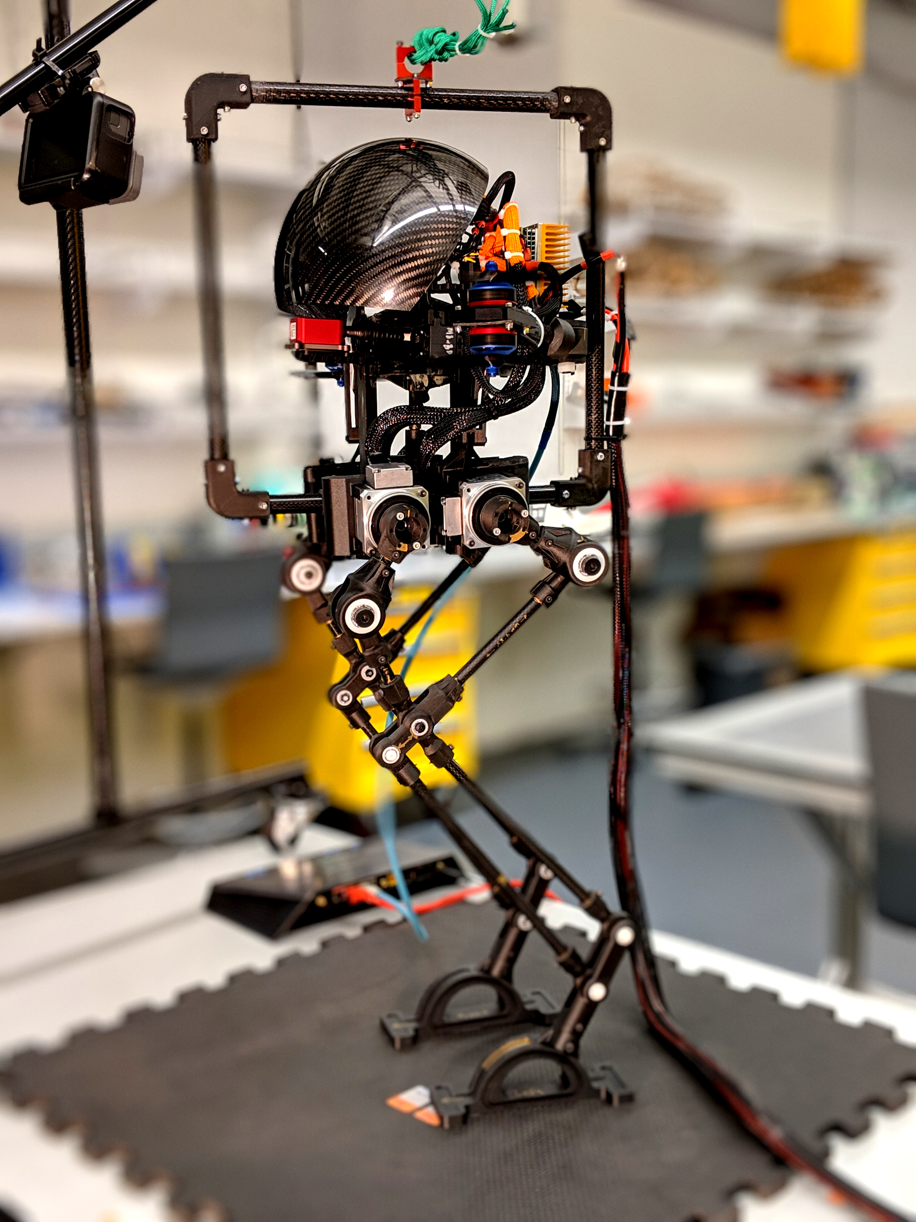 A Bipedal Robot That Walks, Flies, and Never Falls - Electrical ...